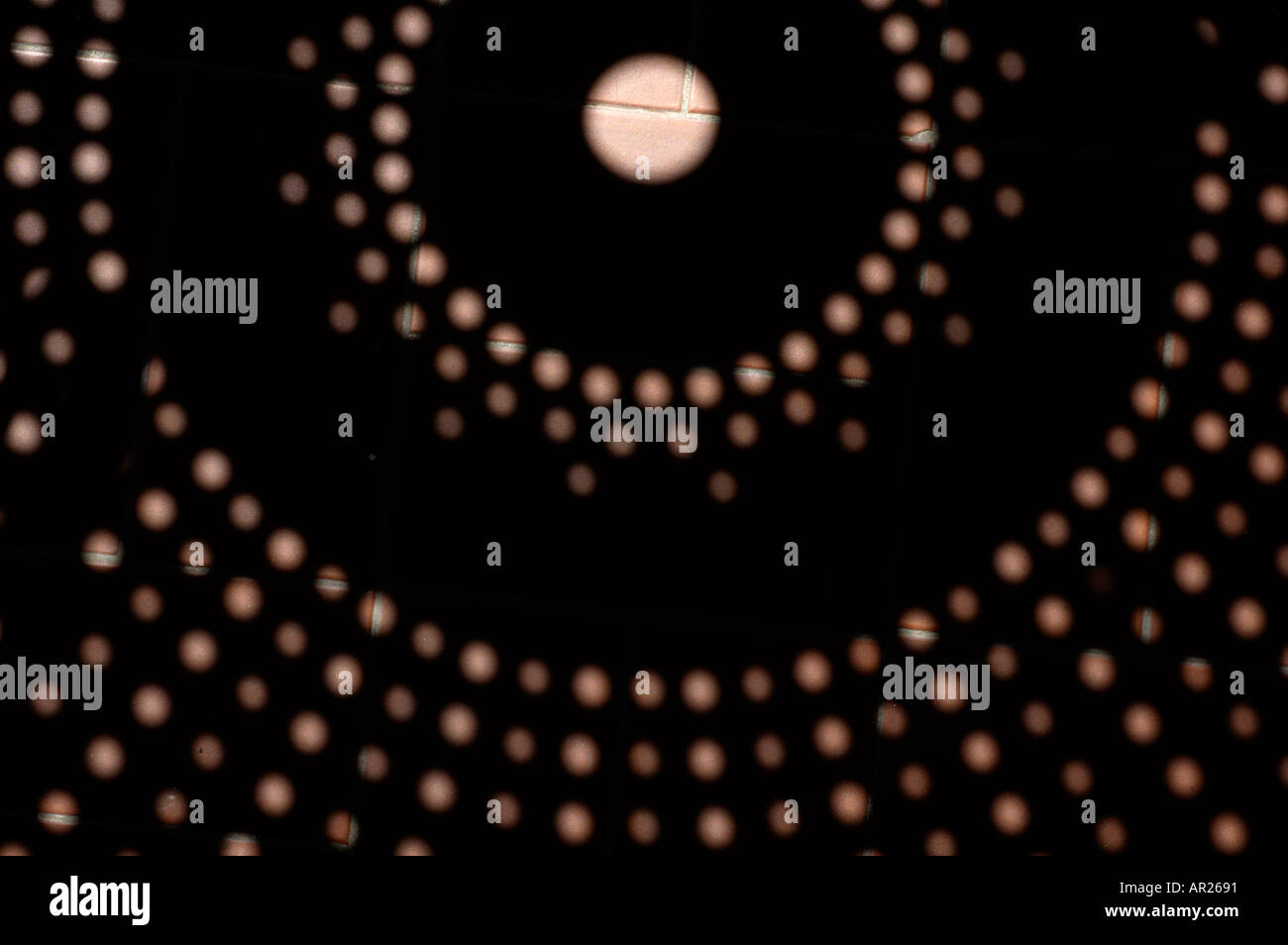 Spotlight on the floor drawing an abstract shape Stock Photo - Alamy