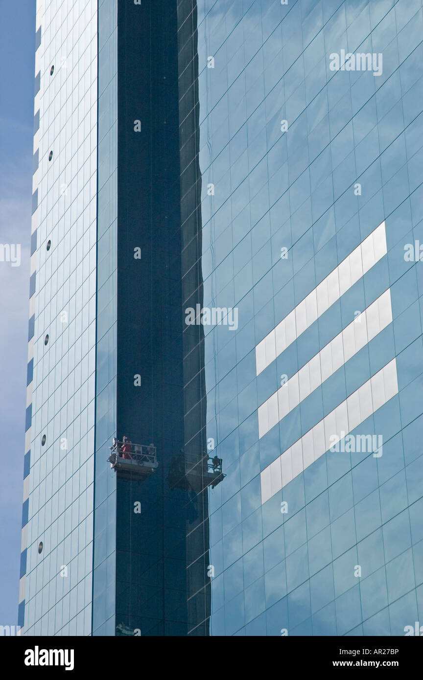 Window cleaner at work, large glass building! Stock Photo - Alamy