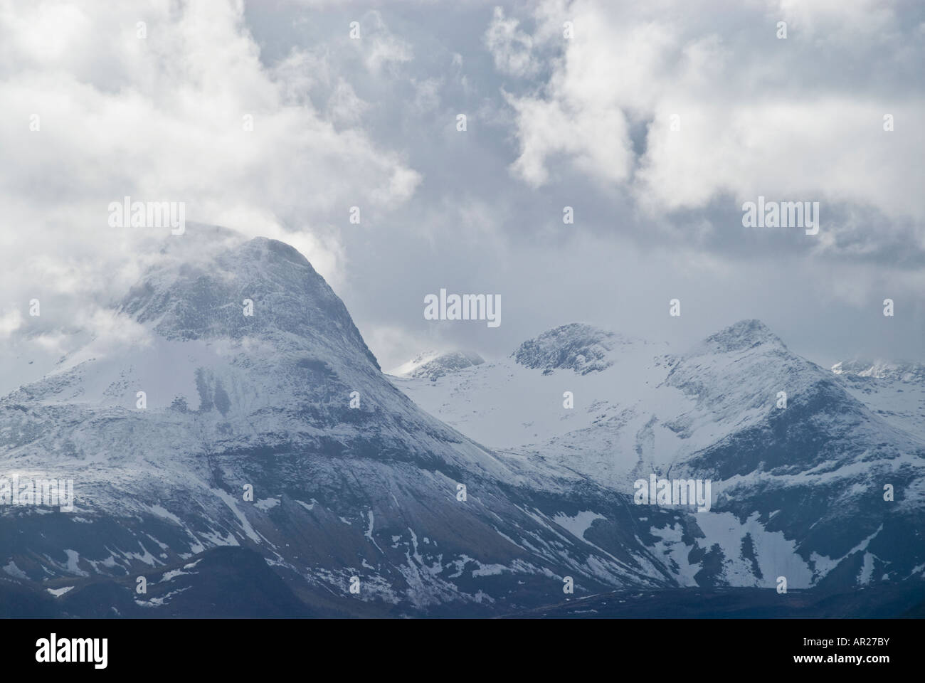Stormy snow covered mountains along Norwegian coast Stock Photo - Alamy