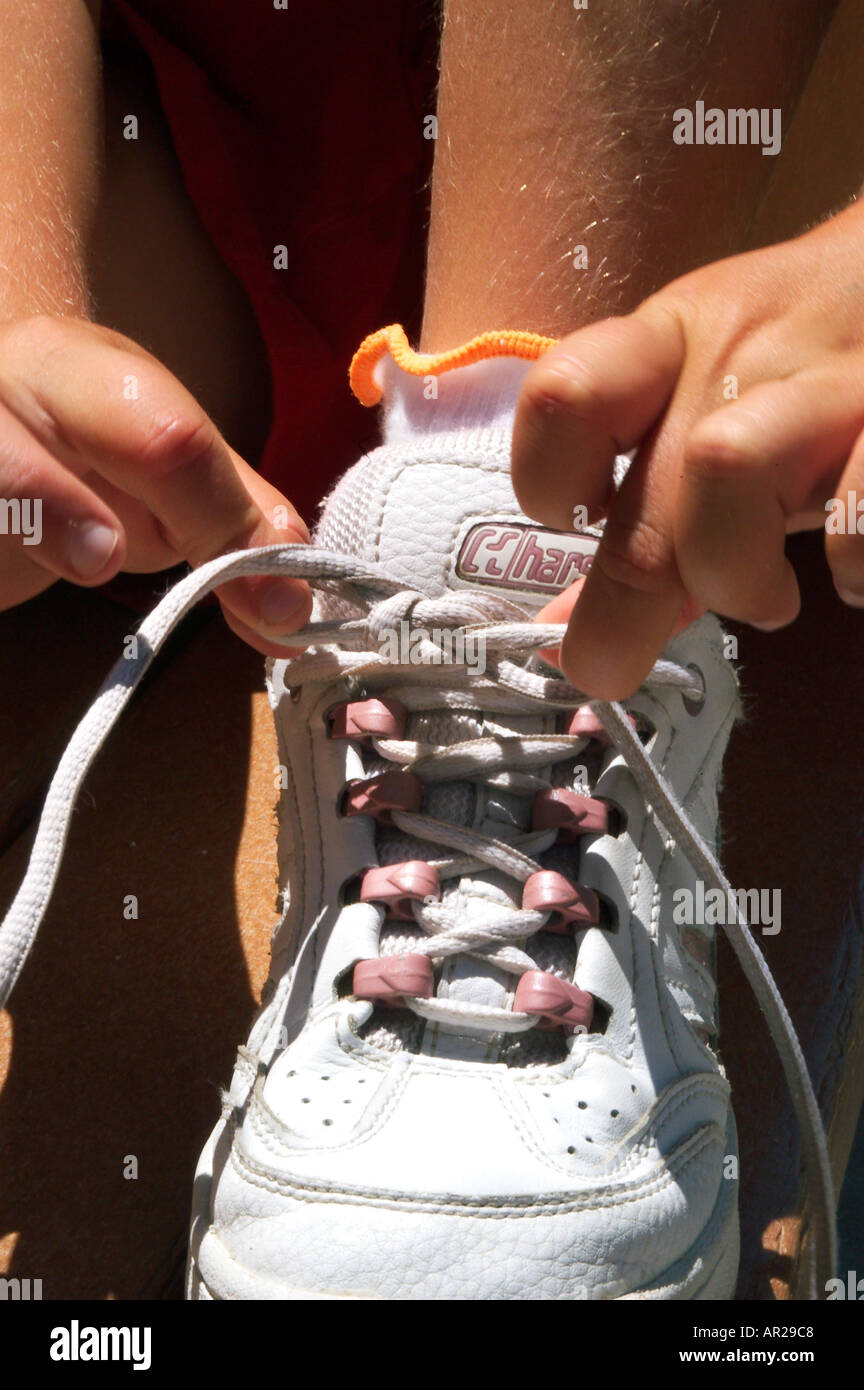 Tieing sneakers hi-res stock photography and images - Alamy