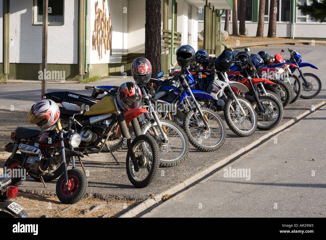 mopeds in park at school yard Stock Photo - Alamy