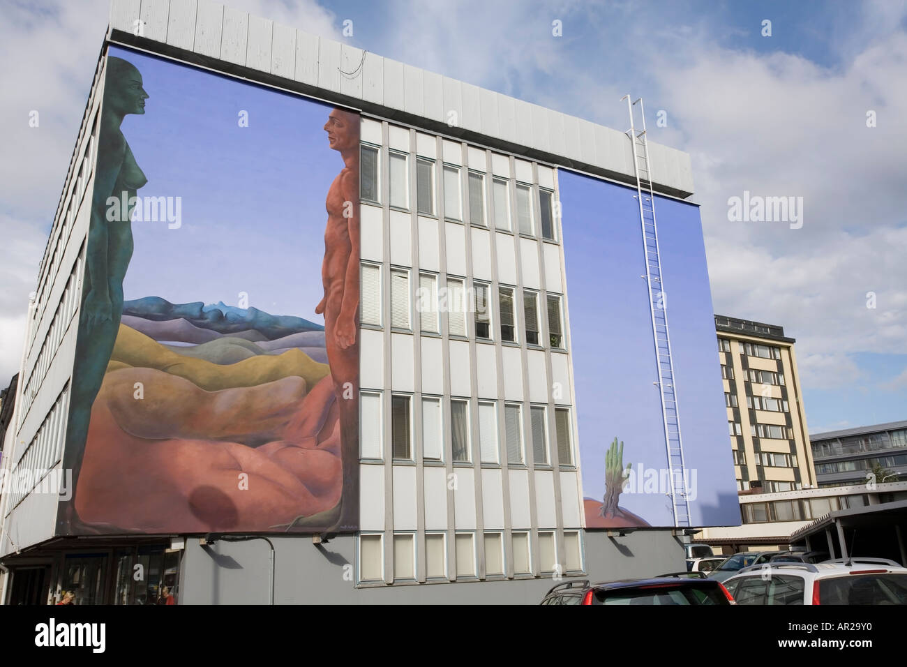 two large paintings on building wall Stock Photo - Alamy