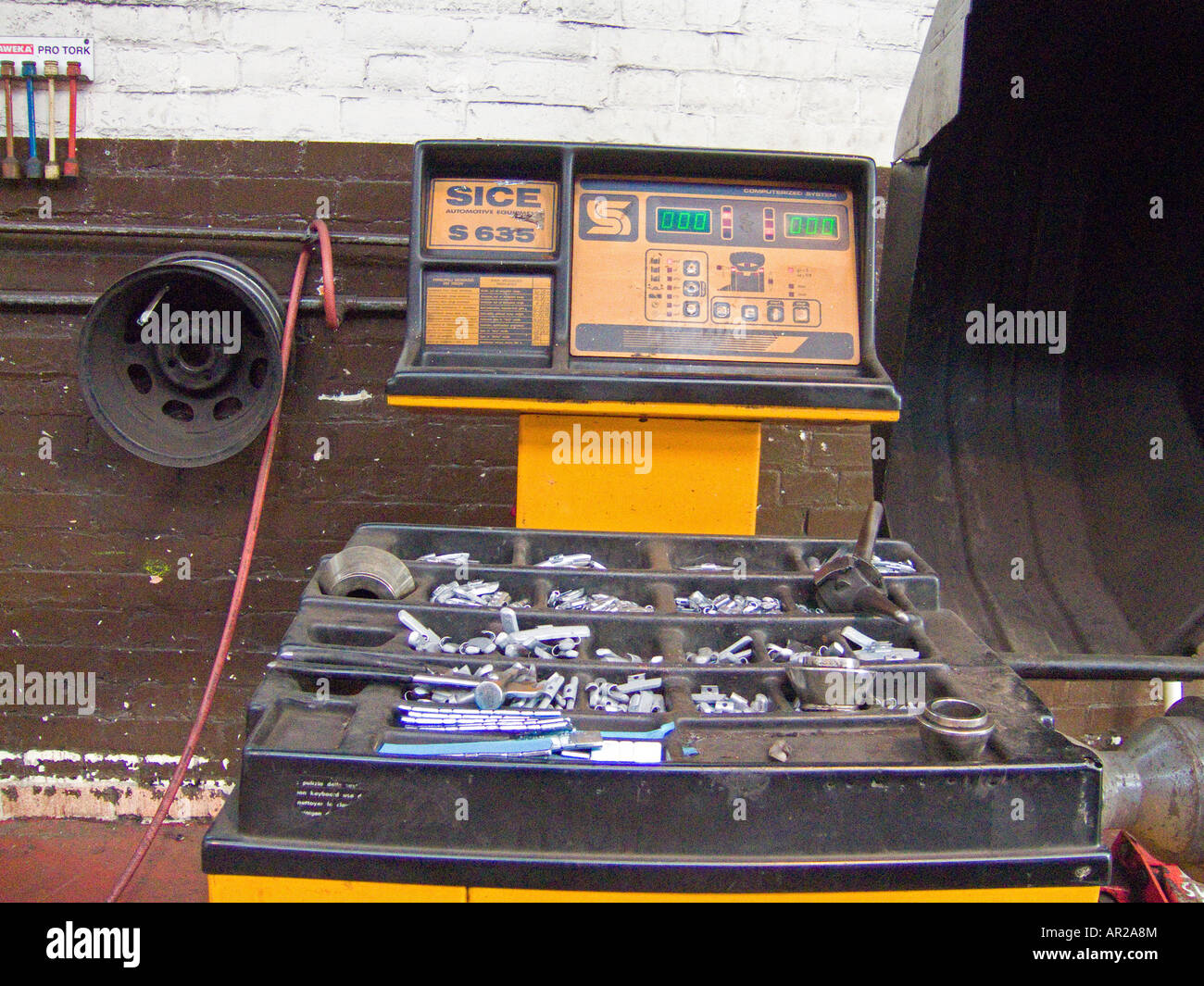 Tyre fitter hi-res stock photography and images - Alamy