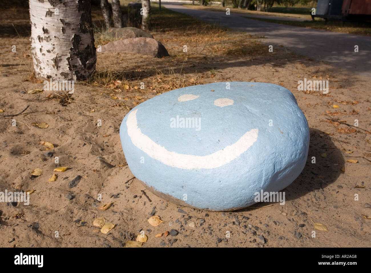 Smiley face on rock hi-res stock photography and images - Alamy