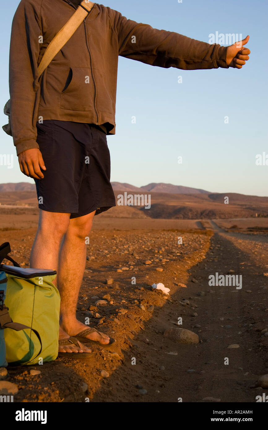 Man hitchhiking in Baja Mexico Stock Photo - Alamy