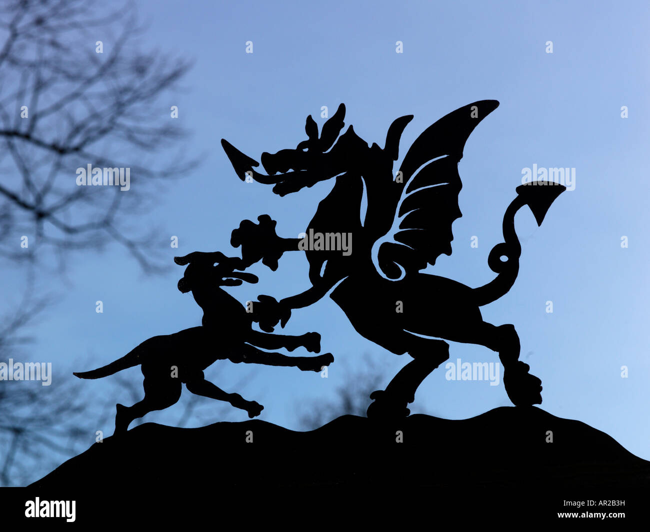 Village Sign West Clandon Surrey Dragon and Dog Stock Photo - Alamy