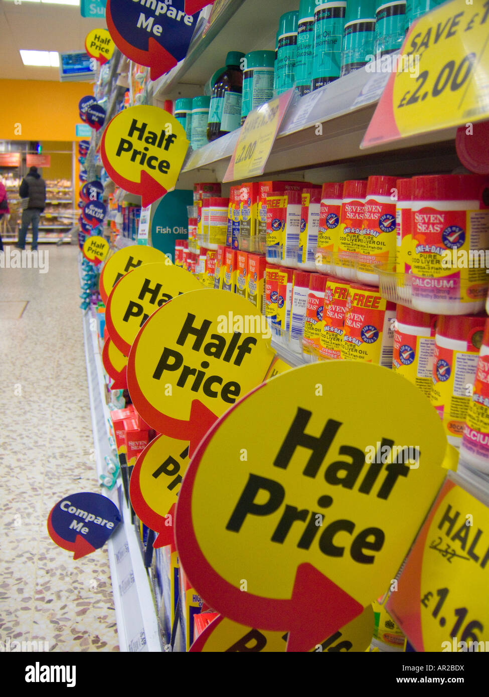 Half Price signs in a supermarket, uk Stock Photo - Alamy
