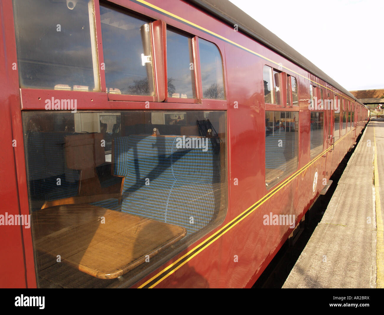 railway carriage windows red platformr train Stock Photo - Alamy