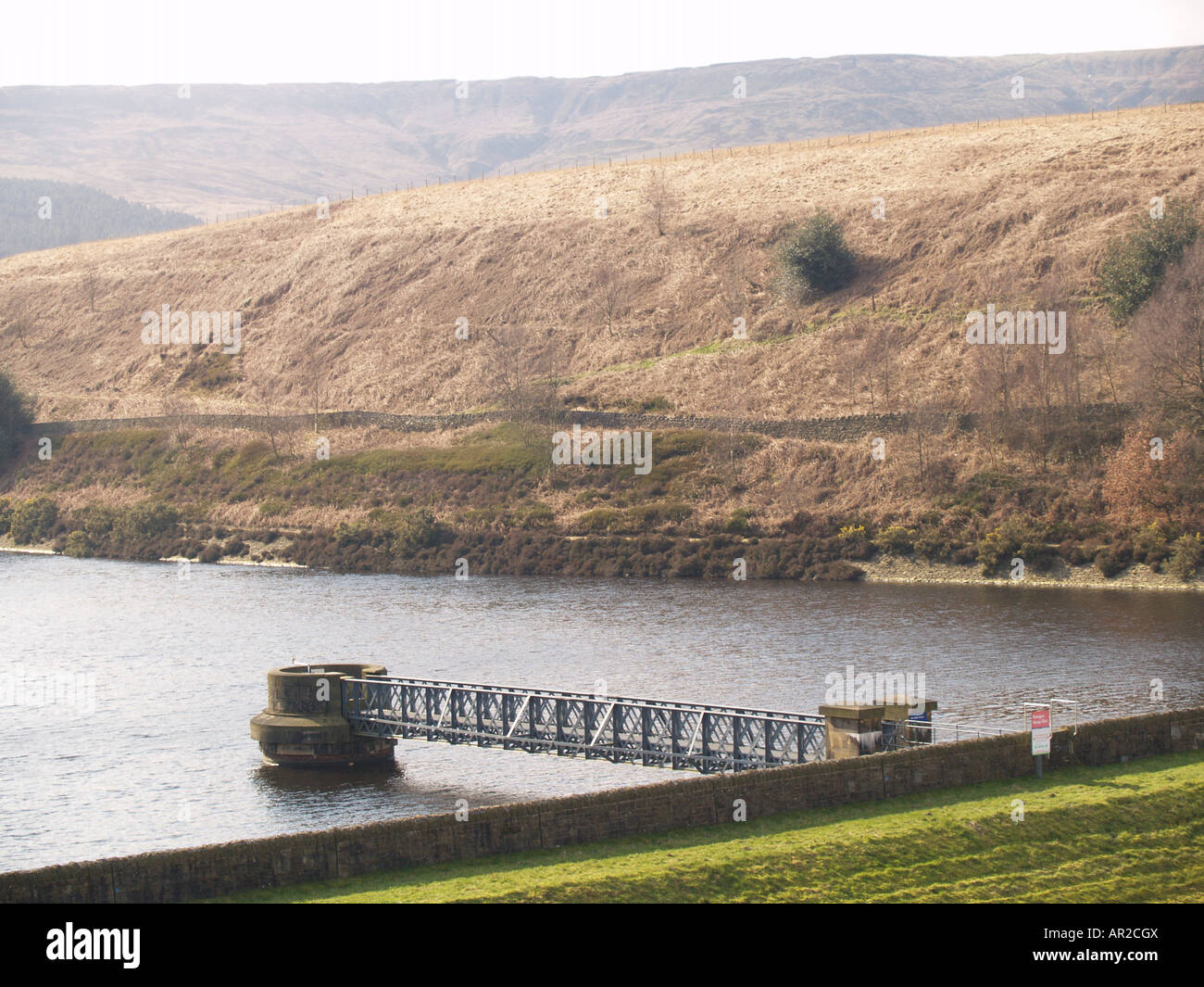 reservoir water dam tgrass hillside pier valley Stock Photo - Alamy