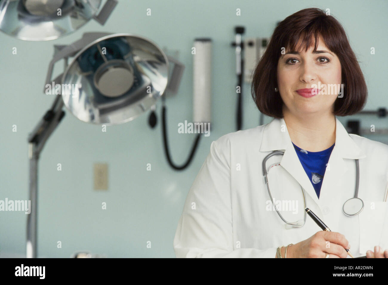Female Latin Doctor, portrait in exam room, Miami Stock Photo - Alamy