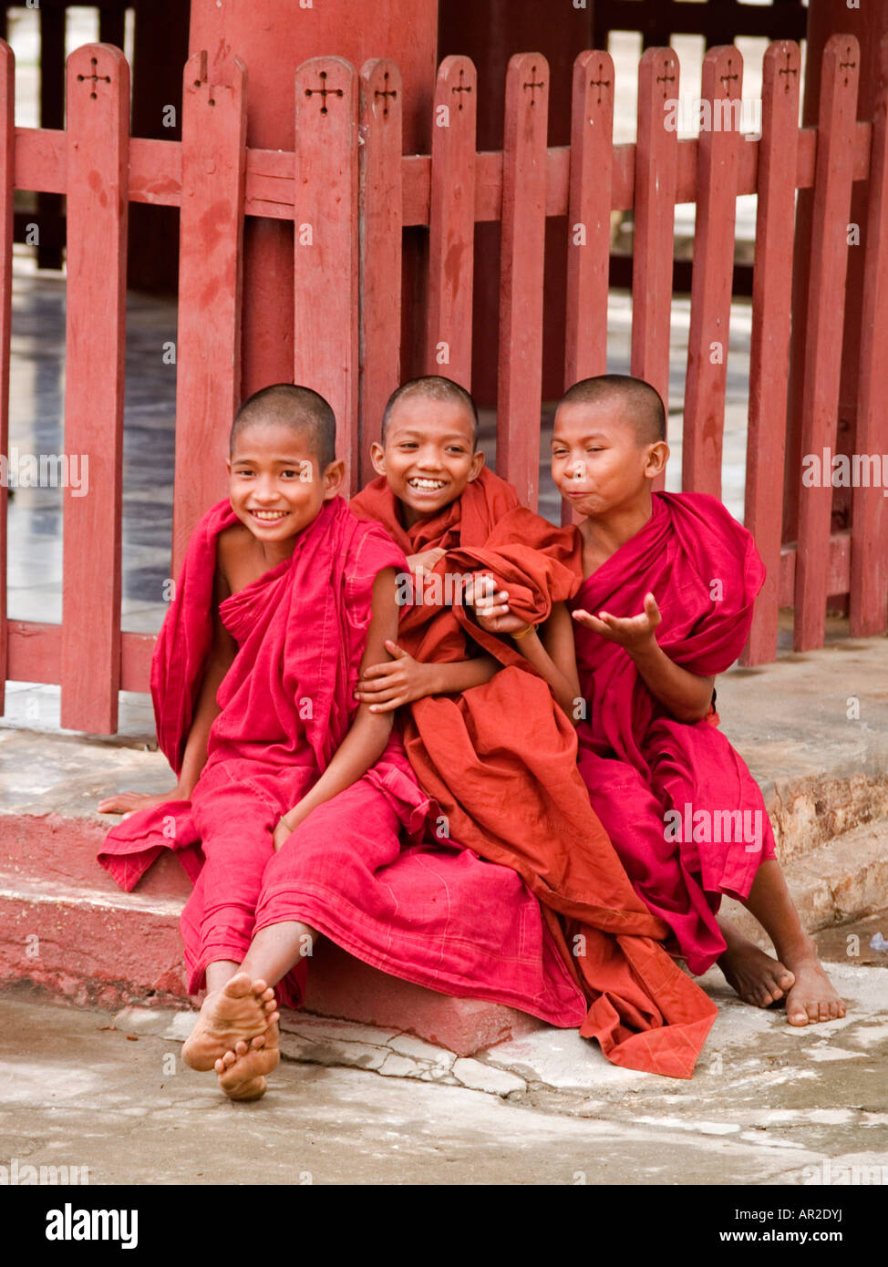 3 Burmese monks playing in Bagan Myanmar Stock Photo - Alamy