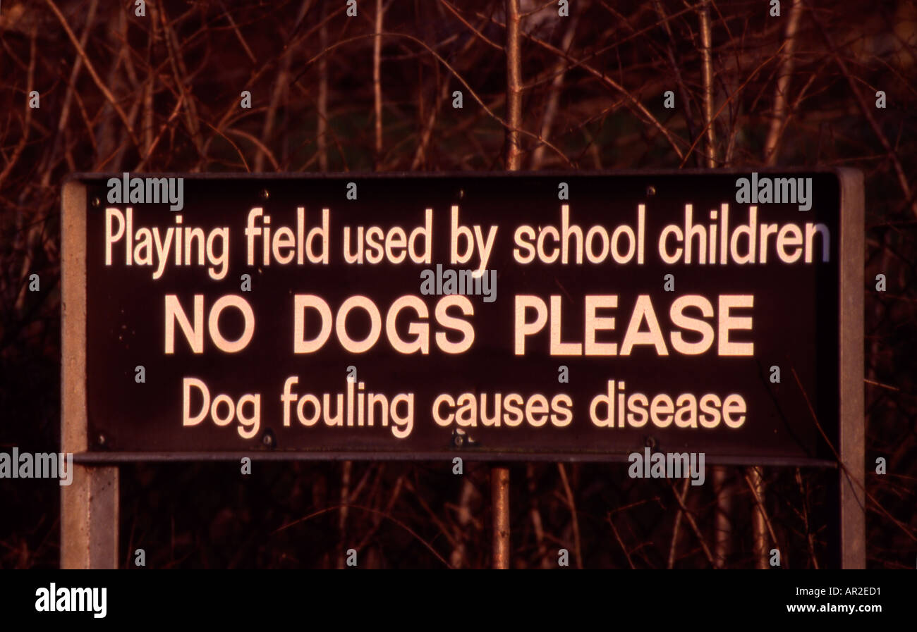 Anti dog fouling sign near childrens playground Stock Photo - Alamy