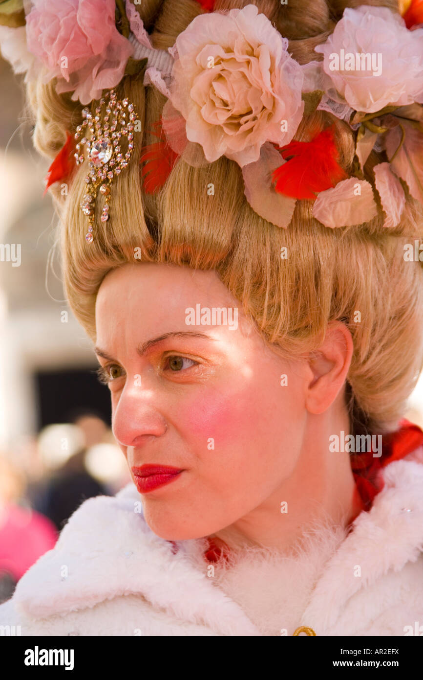 Reveller in mask and costume at the Venice carnival, in St Mark's ...