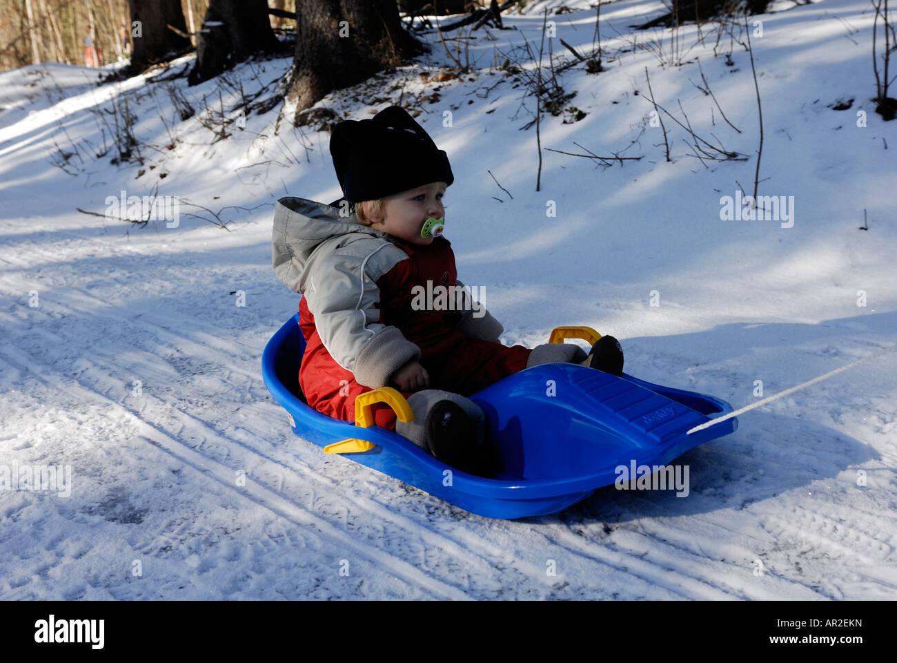 Baby boy winter snow Stock Photo - Alamy