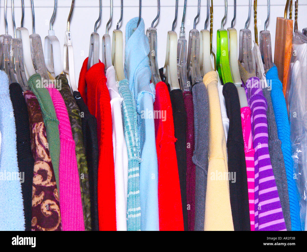 clothes on hangars Stock Photo - Alamy