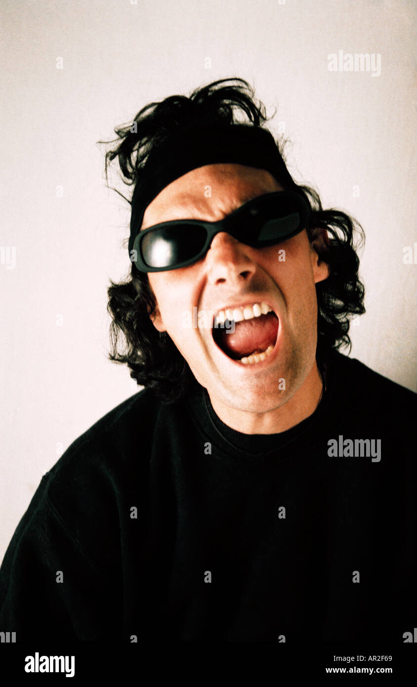 man with black glasses crying Stock Photo - Alamy