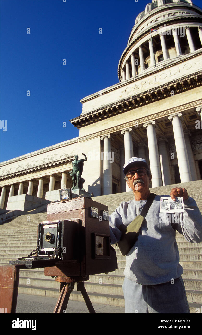 Photographer with antique camera at the Capitolio Nacional Havana Cuba ...