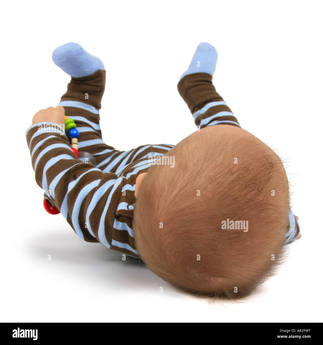 baby with comforter lying on its back Stock Photo - Alamy