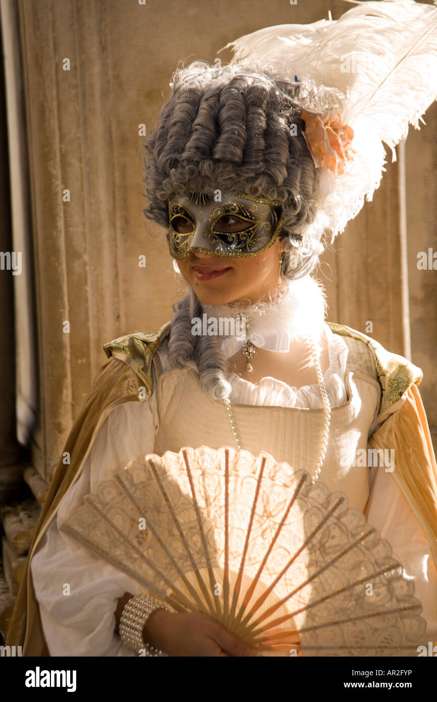 Reveller in mask and costume at the Venice carnival, in St Mark's ...