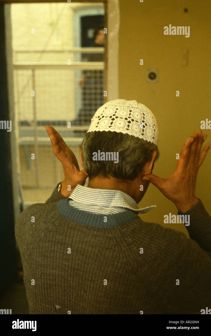 Muslim prisoner saying prayers in his cell in C Wing, HMP Wormwood ...
