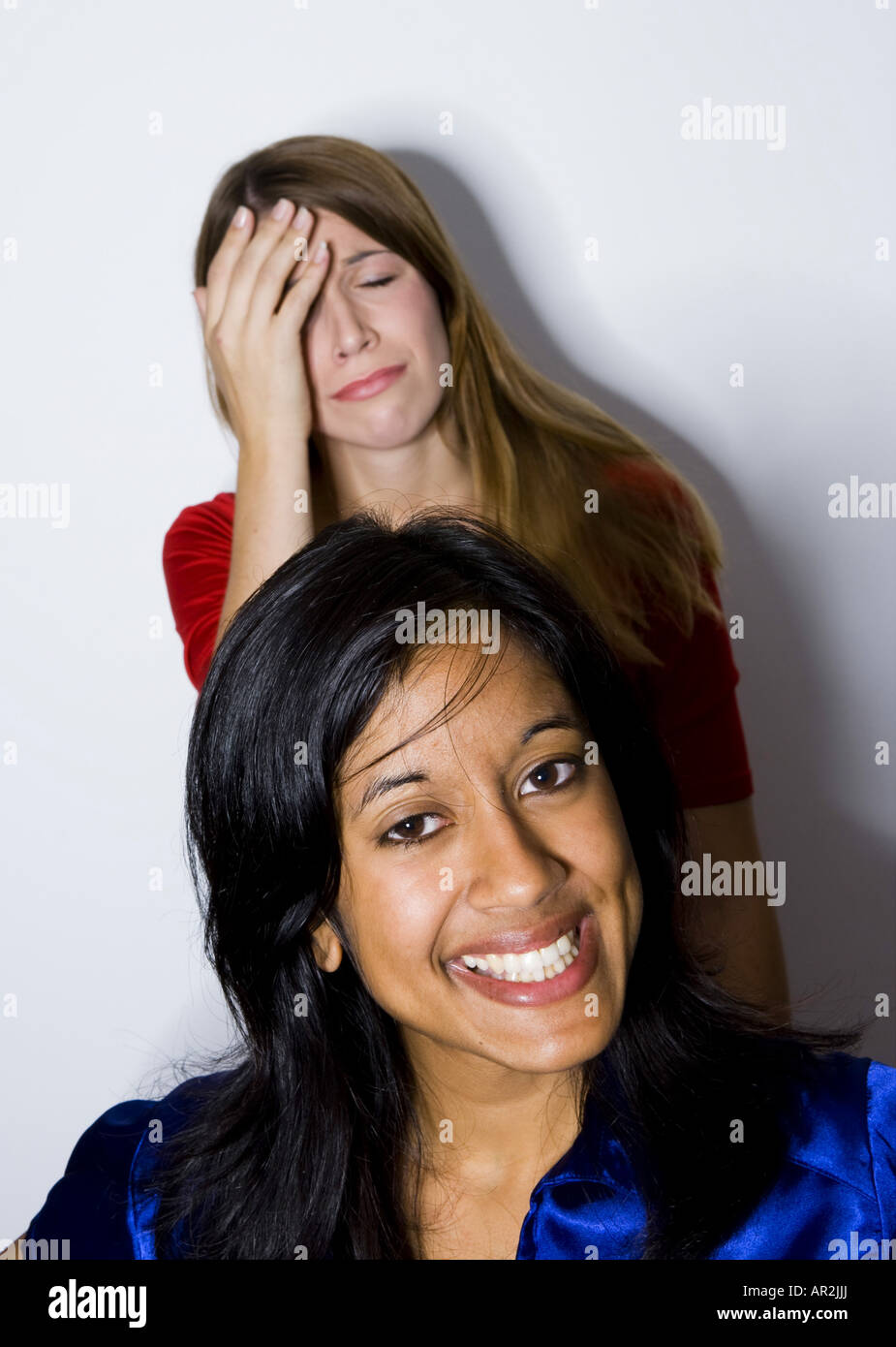 Two People Crying Together