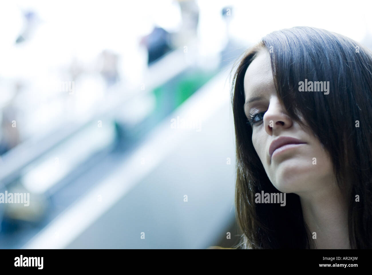 Young woman looking sceptical hi-res stock photography and images - Alamy