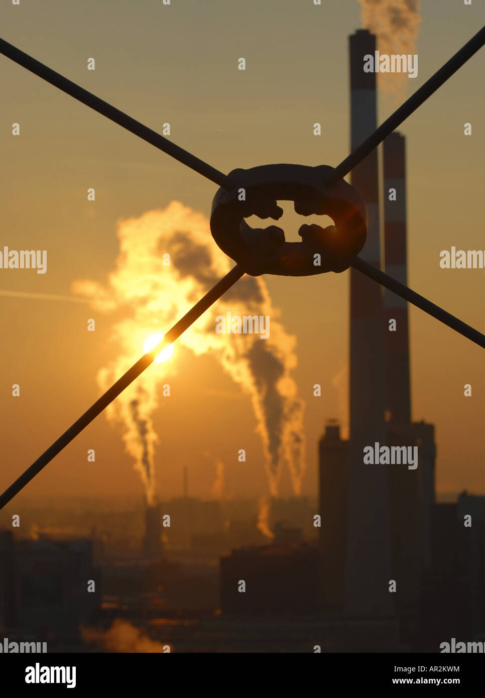 chimneys with factory fumes at sunset Stock Photo - Alamy
