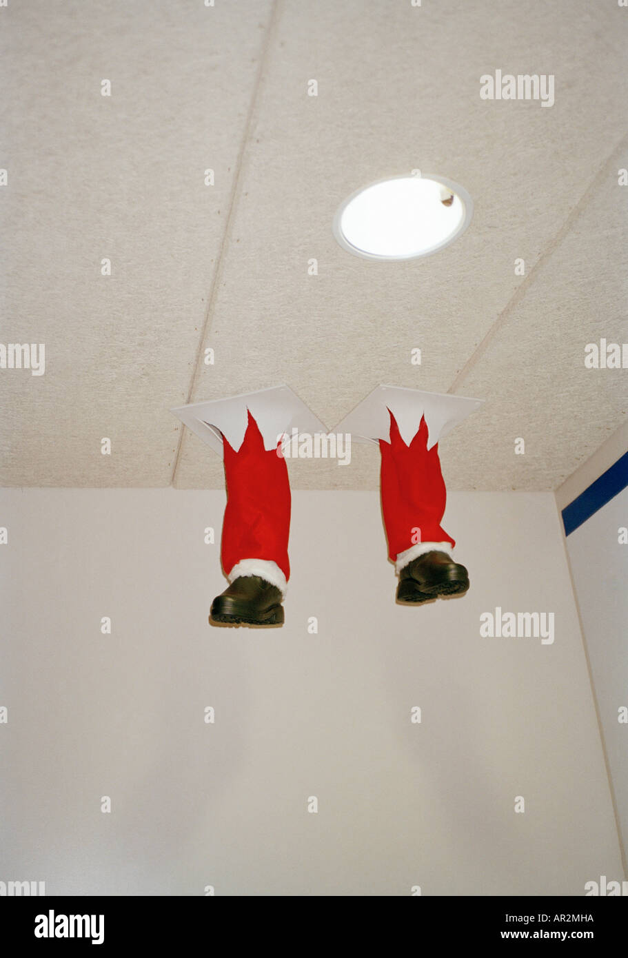 Santa Claus falling through the ceiling Stock Photo - Alamy
