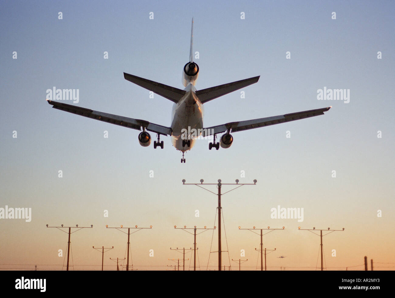 Rear view of airplane landing hi-res stock photography and images - Alamy