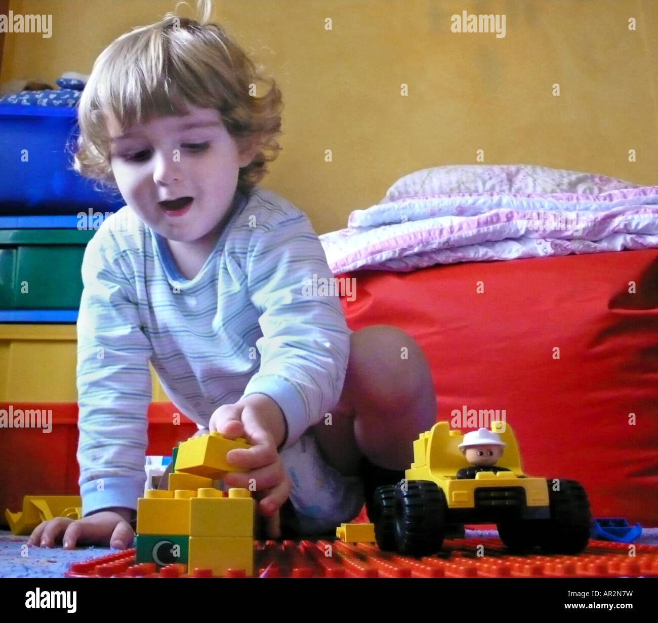 little boy playing with Lego bricks Stock Photo - Alamy