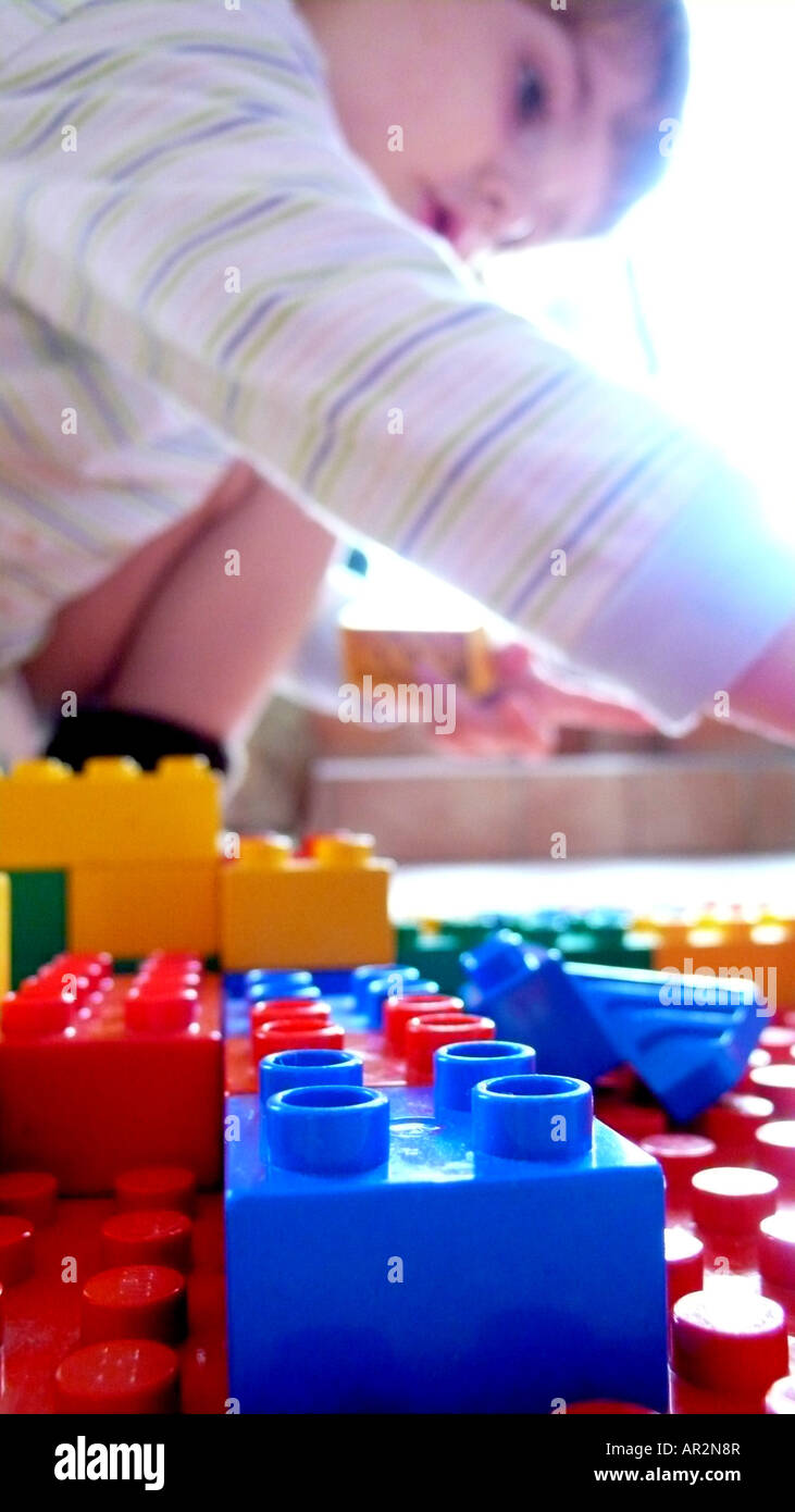 little boy playing with Lego bricks Stock Photo - Alamy
