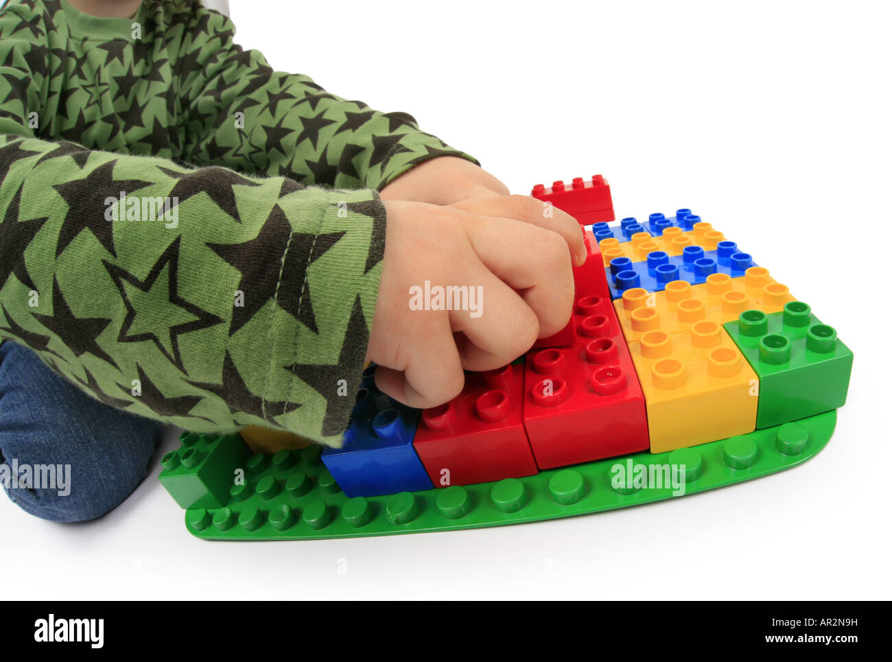 little boy playing with Lego bricks Stock Photo - Alamy