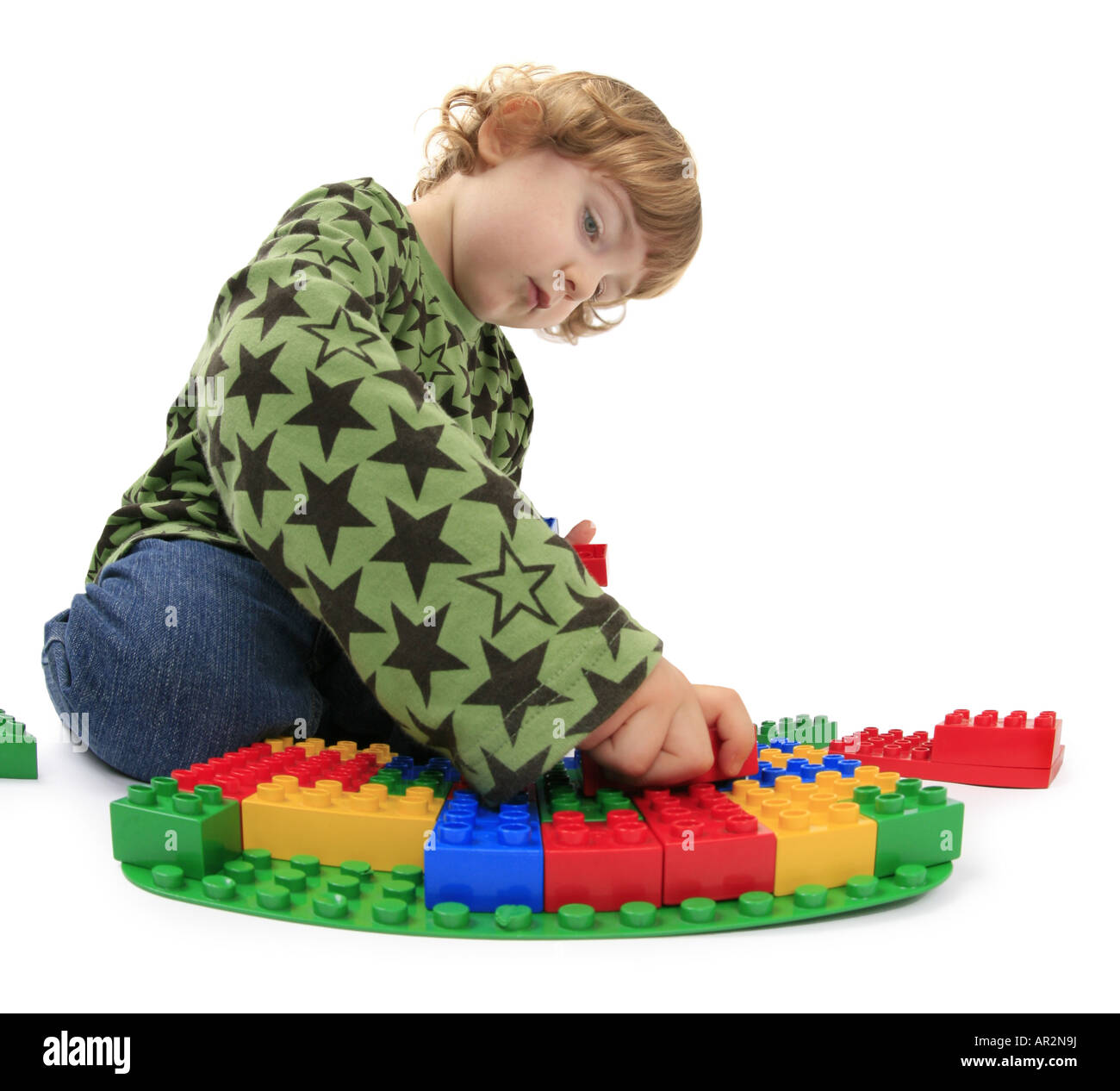 little boy playing with Lego bricks Stock Photo - Alamy