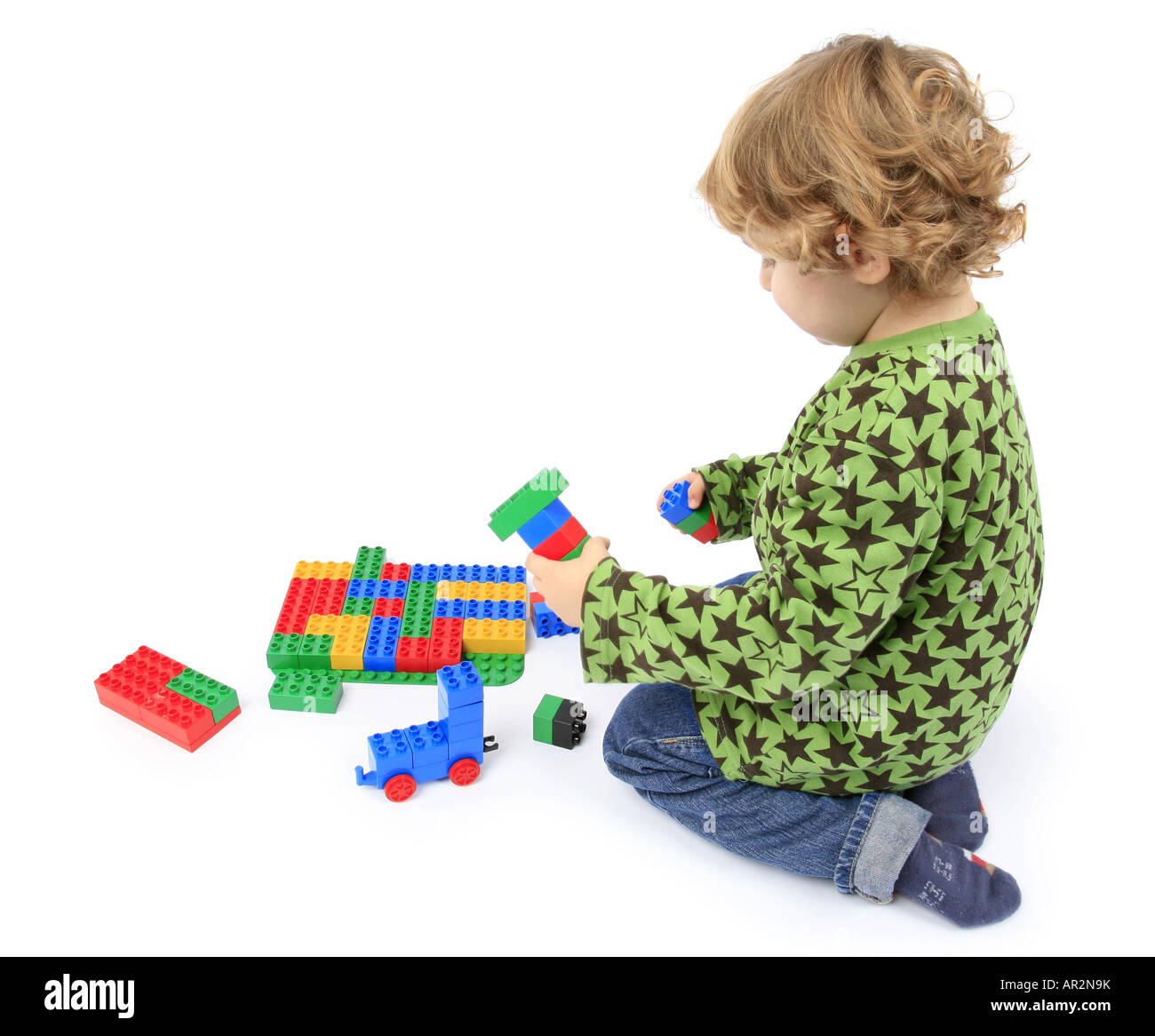little boy playing with Lego bricks Stock Photo - Alamy