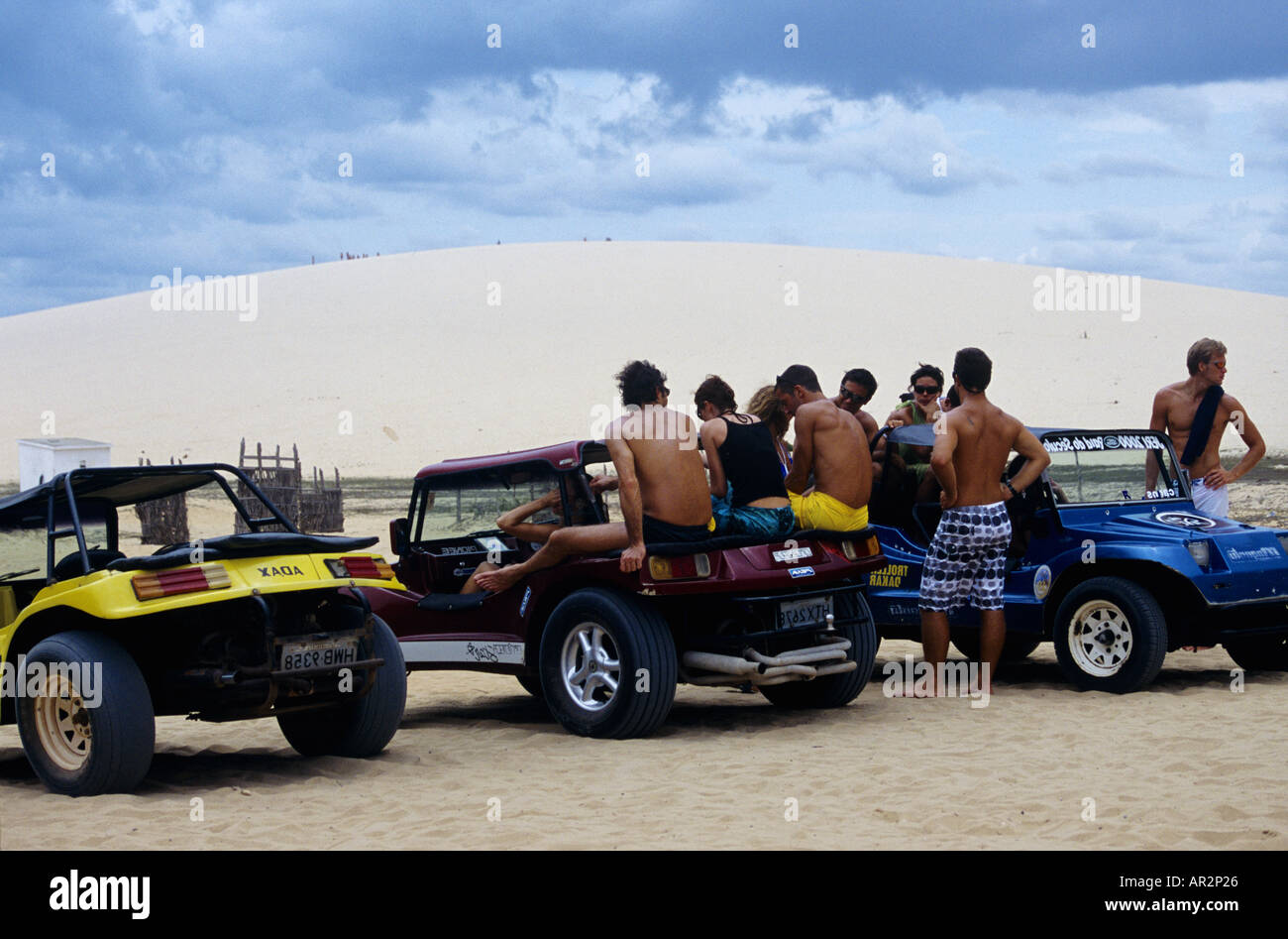 Brazilian sun worshippers and beach buggies, Jericoacoara dunes, Ceara ...