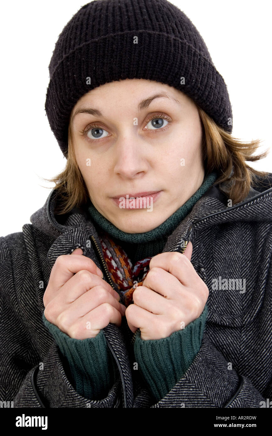 woman in winter clothes freezing Stock Photo - Alamy