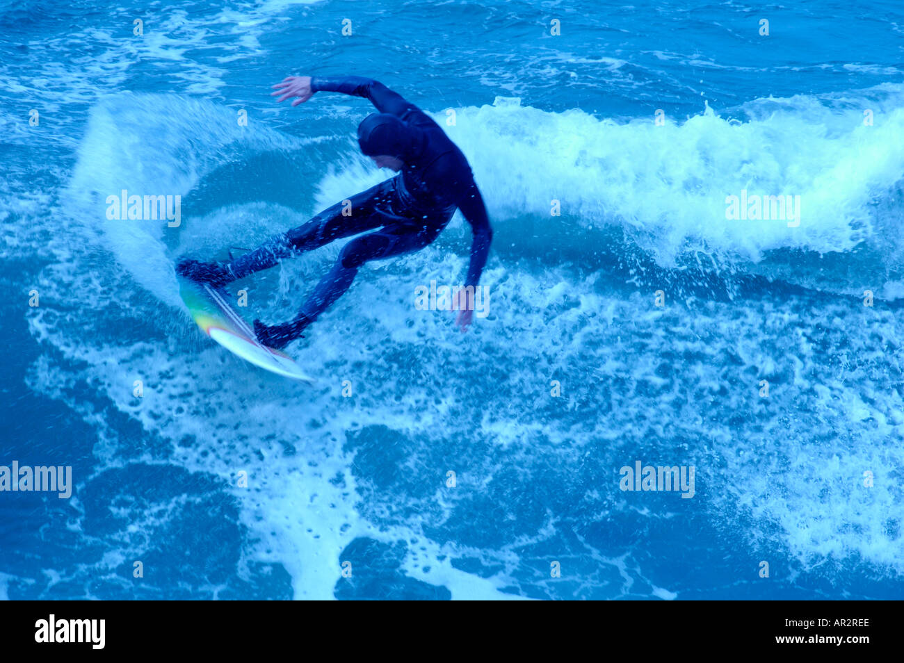 Surfer Riding Ocean Wave Stock Photo - Alamy