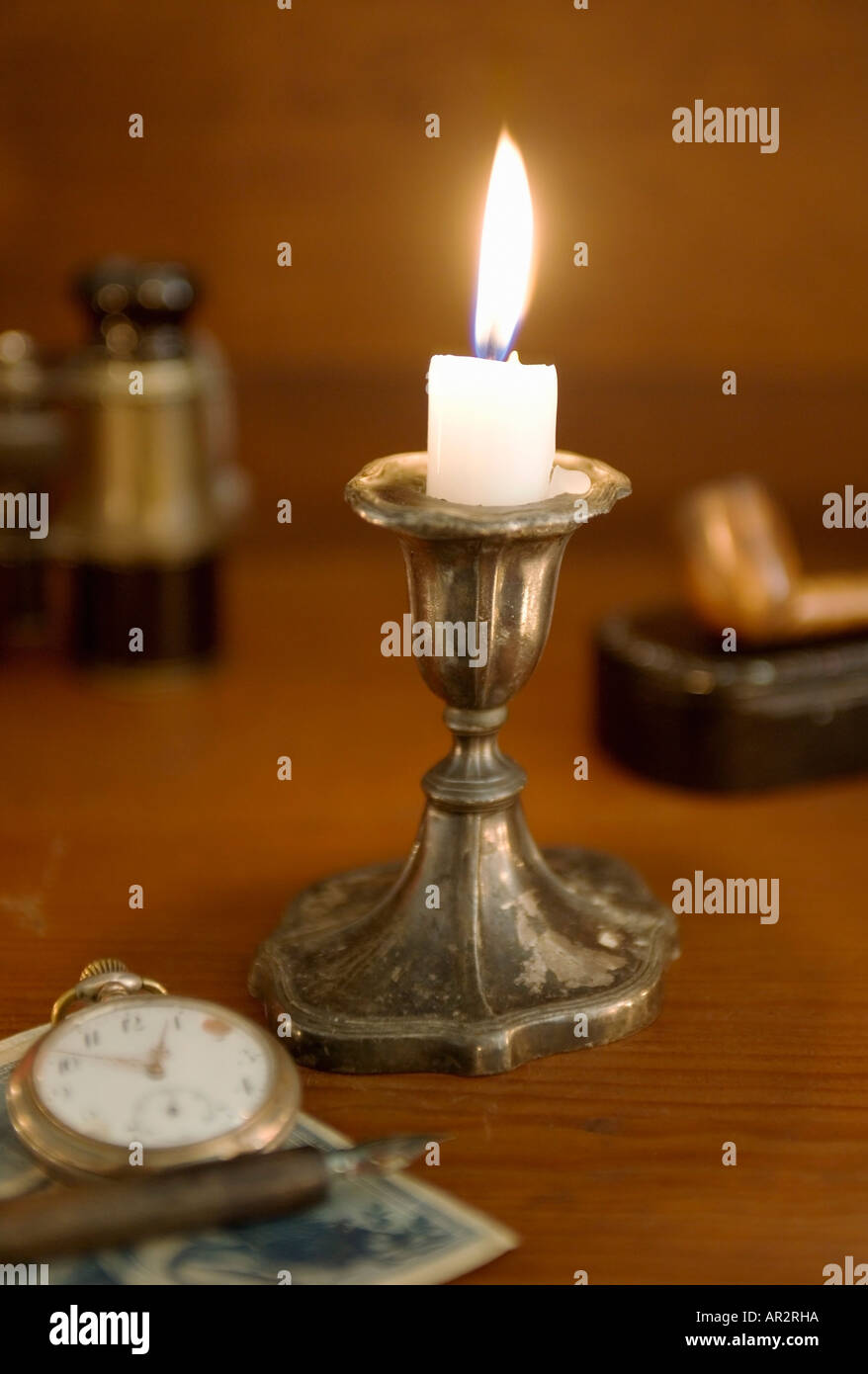 Collection of old fashioned objects focus on candle Stock Photo - Alamy