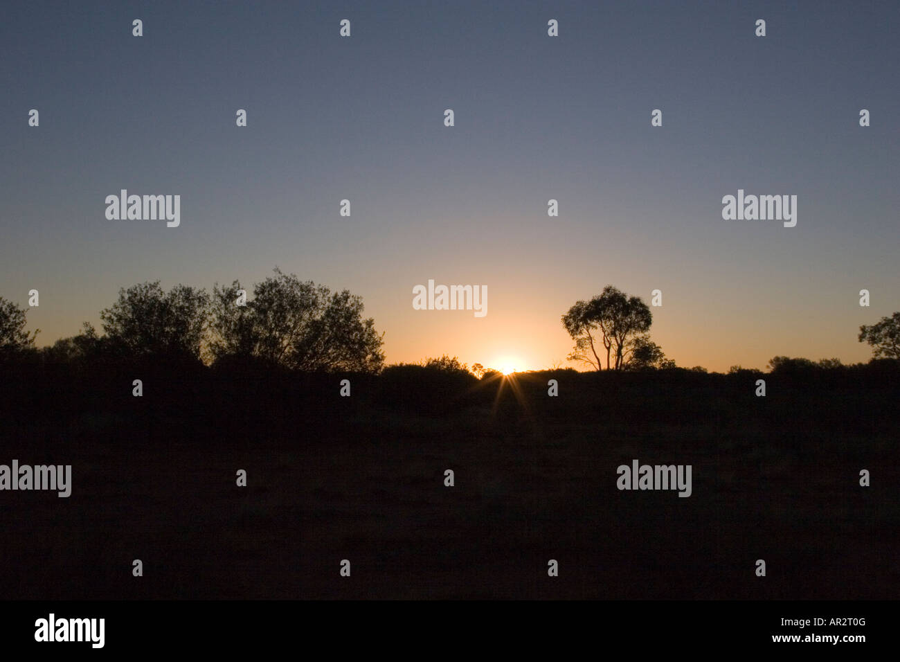 Sunset in the Australian outback Stock Photo - Alamy