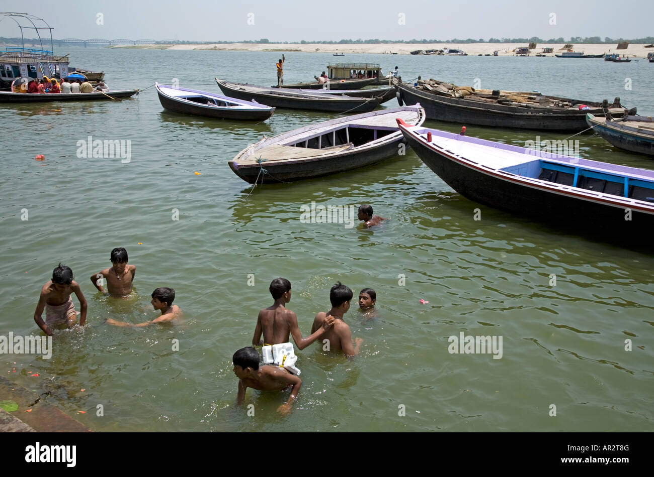 Kids swimming. Dasaswamedh Ghat. Ganges river. Varanasi. India Stock ...