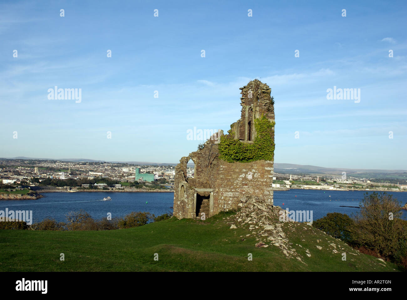 View of old stone folly and Plymouth city, with the Dartmoor hills in ...