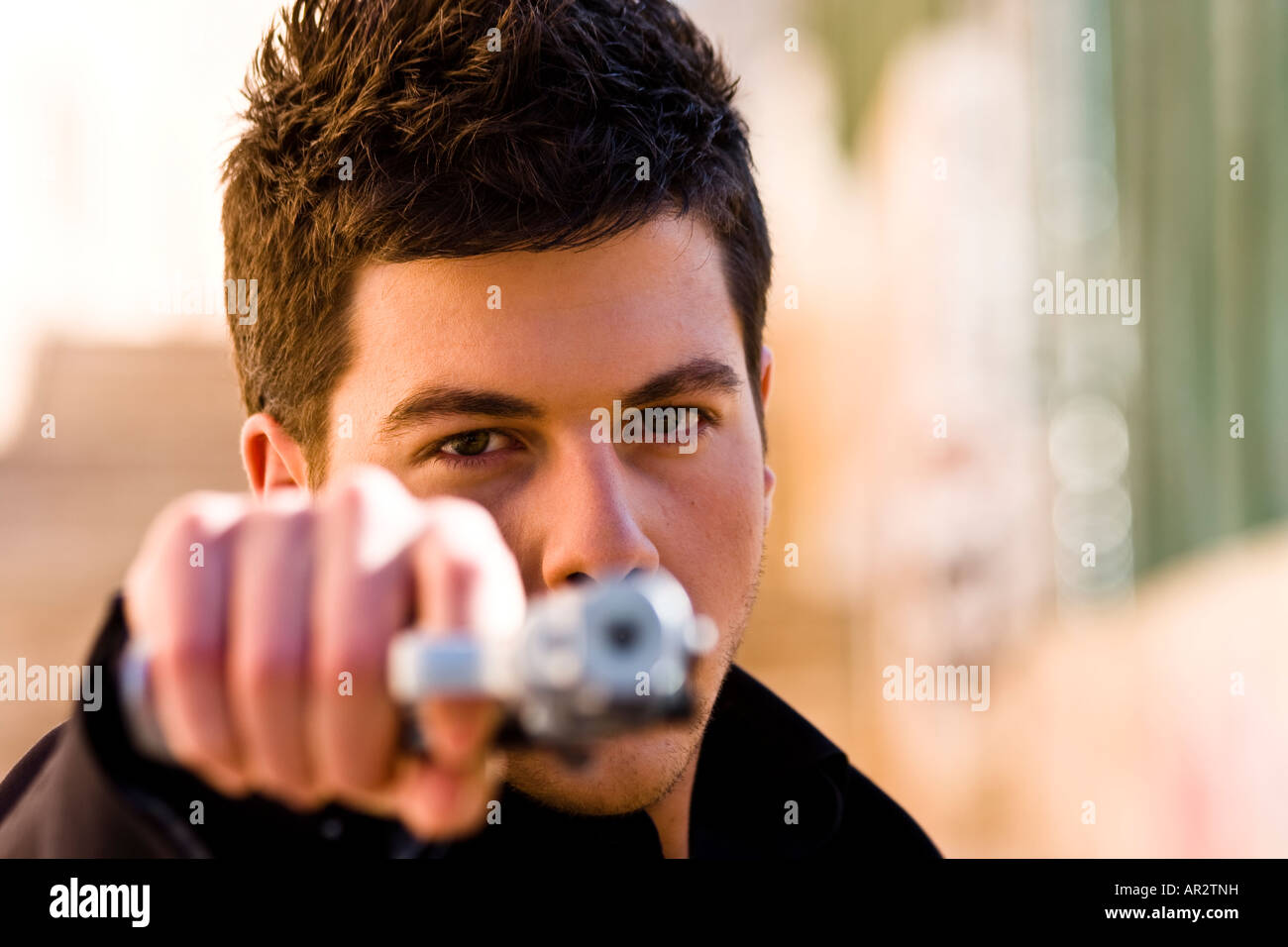 Pointing gun at viewer hi-res stock photography and images - Alamy