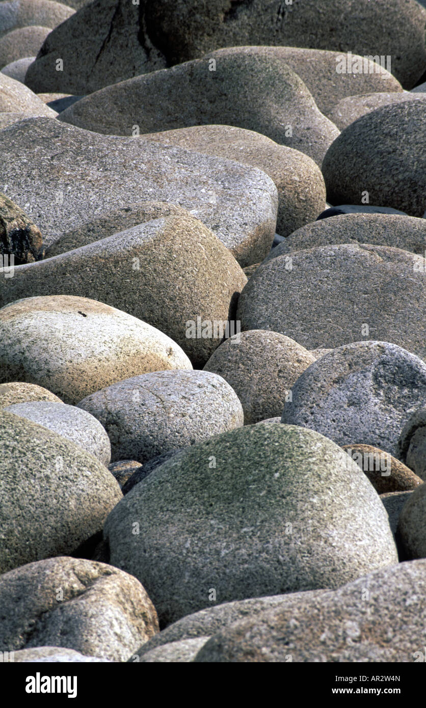 Rounded granite boulders on a west Cornwall beach Stock Photo - Alamy