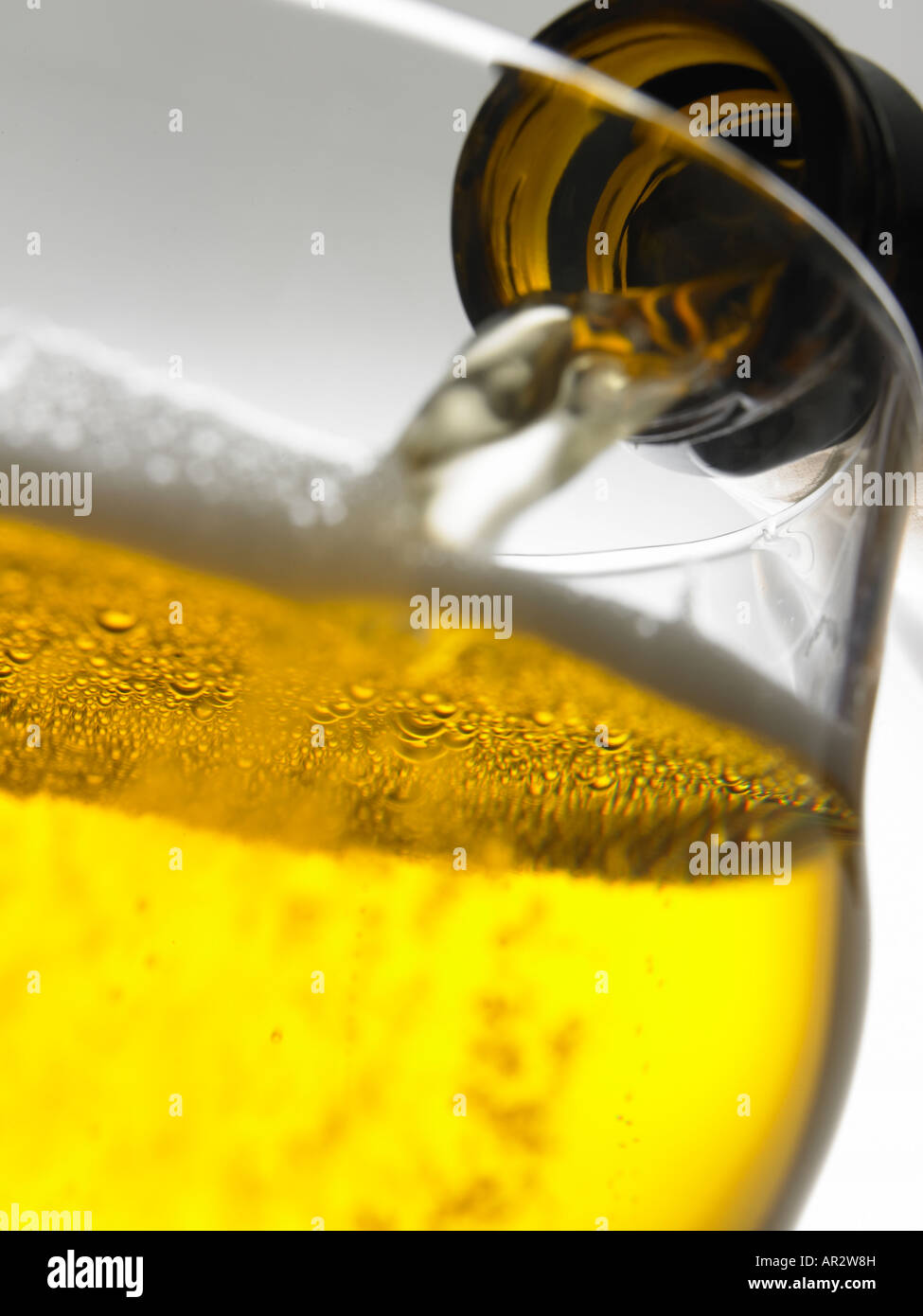 pouring a Pint of Lager Stock Photo - Alamy