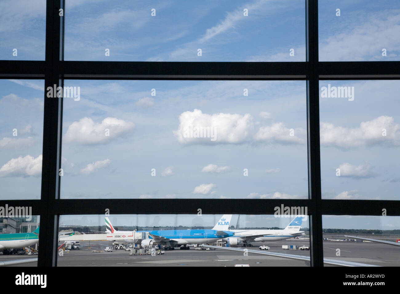 Airport window with big blue sky and clouds Stock Photo - Alamy