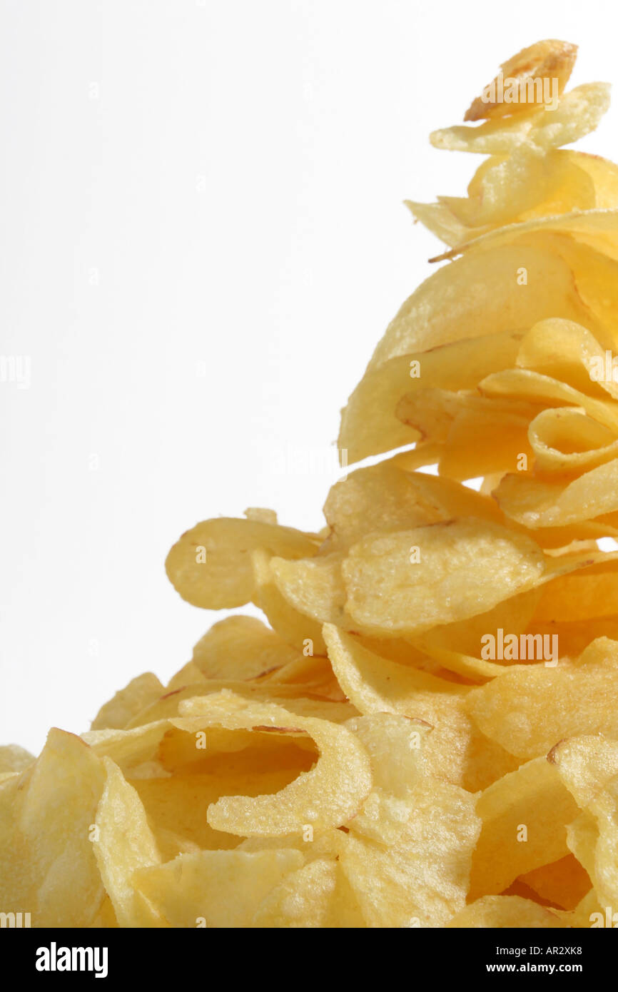 A multitude of crisps with a white background Stock Photo - Alamy