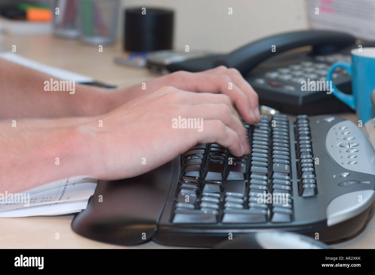 man behind computer Stock Photo - Alamy