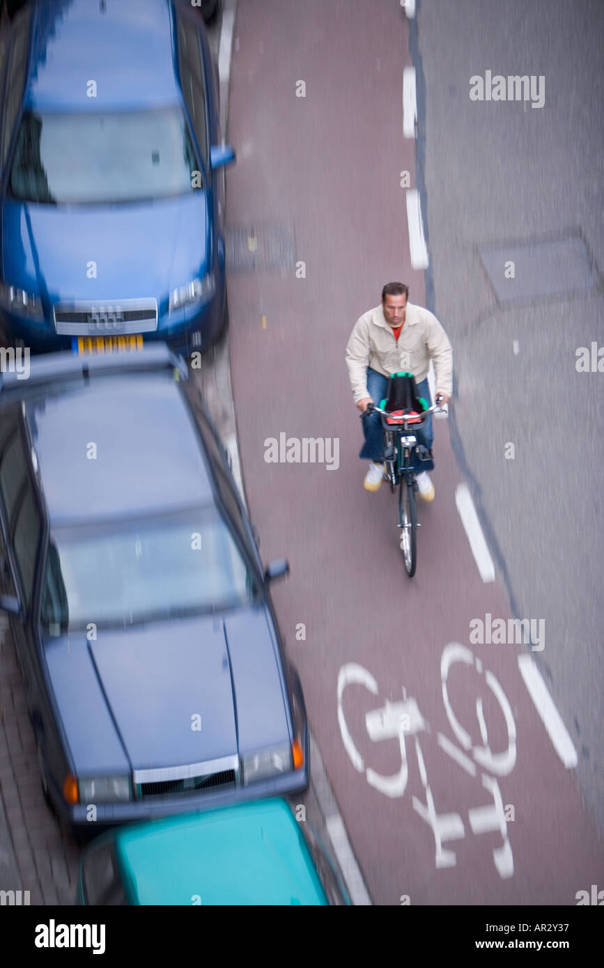 HOLLAND AMSTERDAM OVERHEAD VIEW OF MAN ON BIKE IN CYCLE LANE Stock ...