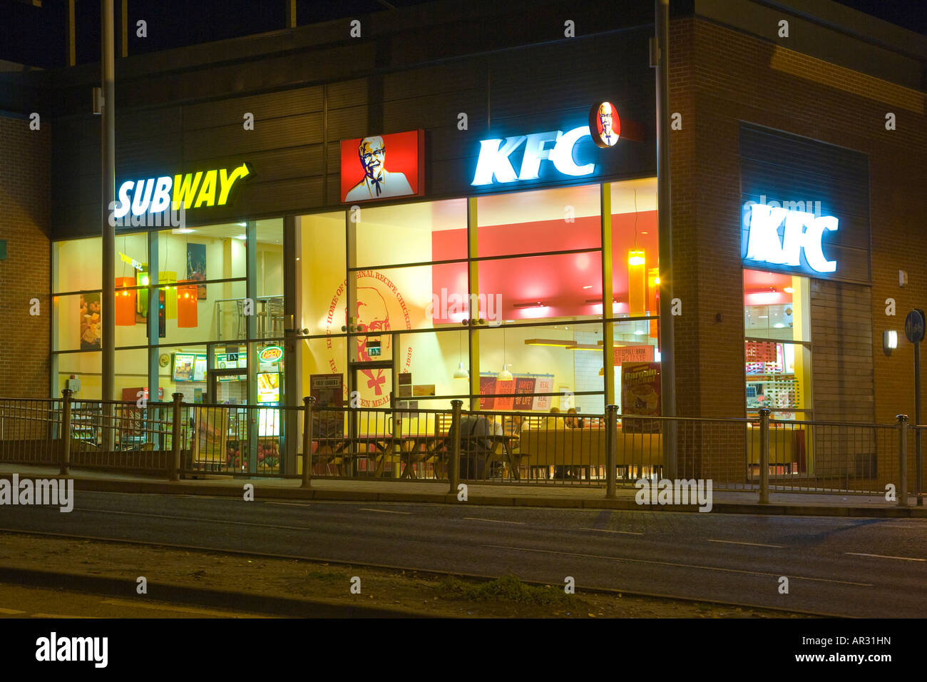 KFC and Subway food restaurants at night in Bury St Edmunds, UK Stock ...