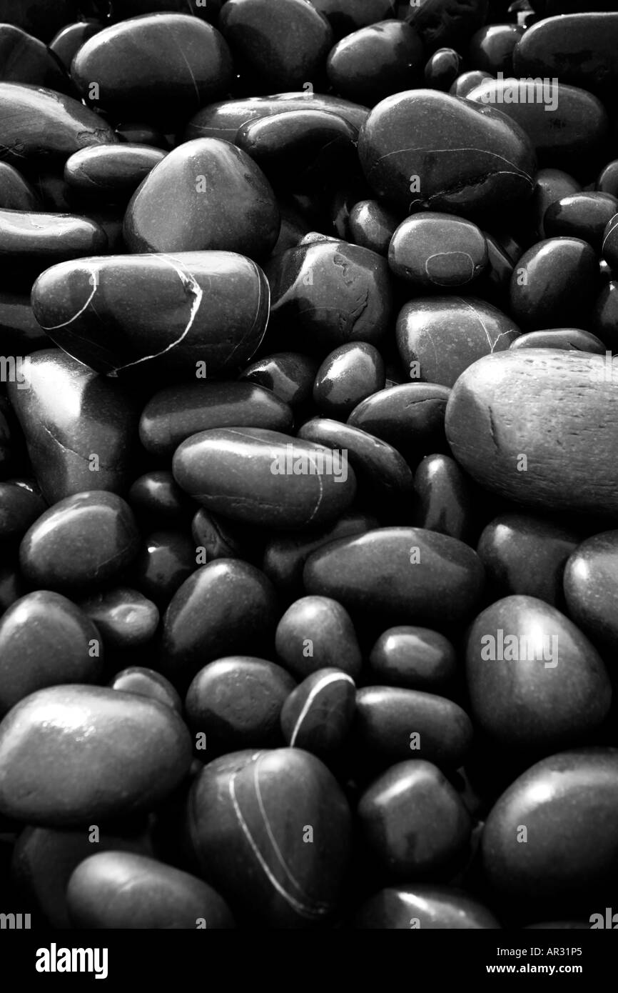 Dark grey pebbles Black and White Stock Photos & Images - Alamy